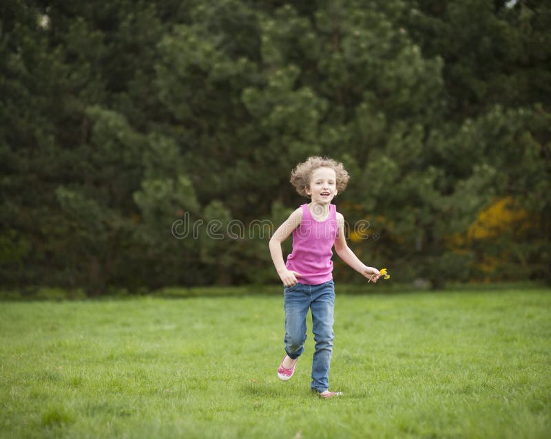 Young Girl Running through Park in Summer Stock Image - Image of girl ...