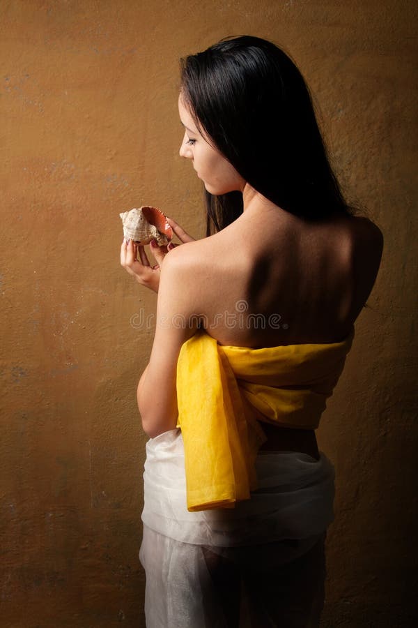 Young girl with shell stock photo. Image of shell, beauty - 16639528