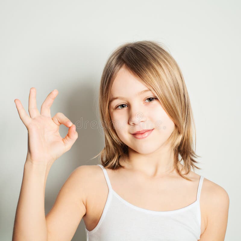 Young Girl Showing Hand Gesture Ok Stock Image - Image of gesture, teen ...