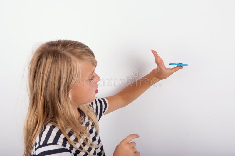 Young Girl Showing How To Fidgeting Stock Image - Image of balance ...