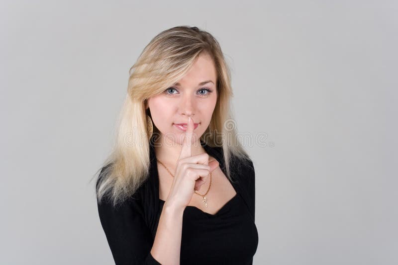 Young Girl Shows a Hush Sign Stock Image - Image of hush, confidence ...