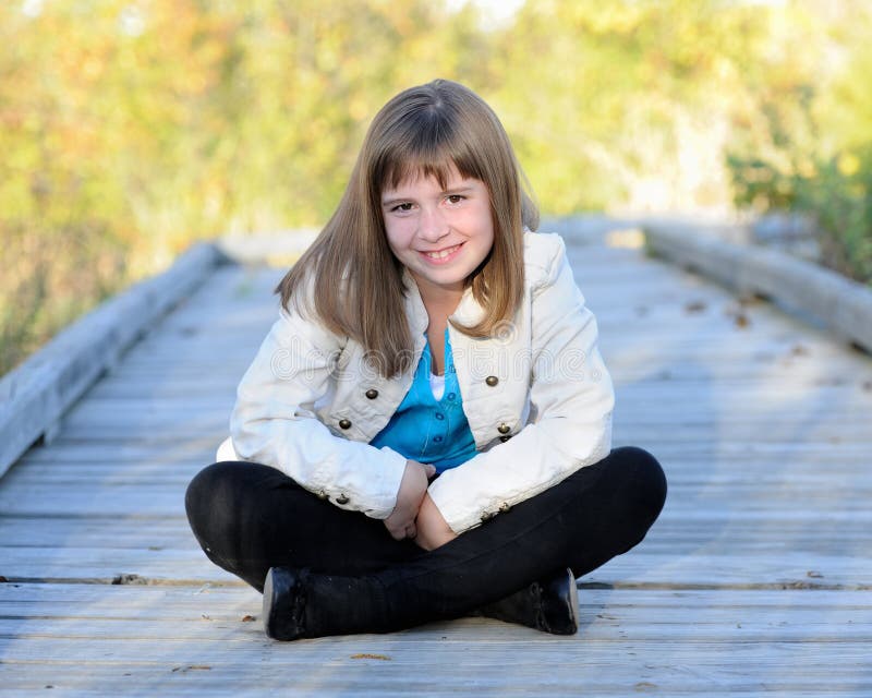 Young Girl Sitting on Front Steps on House Stock Photo - Image of ...