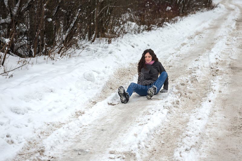 A Young Girl Slipped and Fell. Stock Photo - Image of frosty, female ...