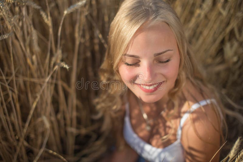Young Girl is Smiling in the Field Stock Photo - Image of countryside ...