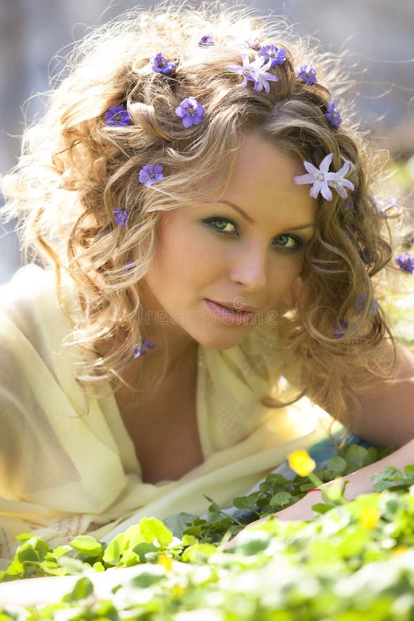 Young Girl and Spring Flowers in Her Hair Stock Photo - Image of people ...