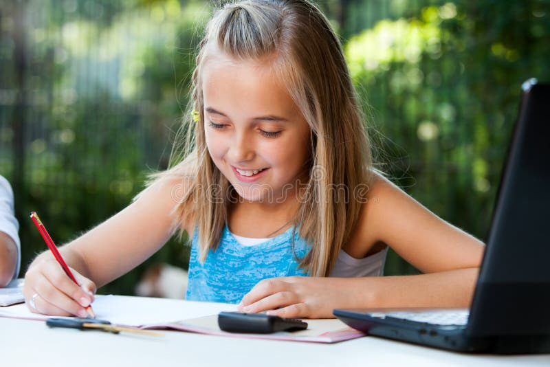 Young Girl with Laptop Doing Homework Stock Image - Image of portrait ...