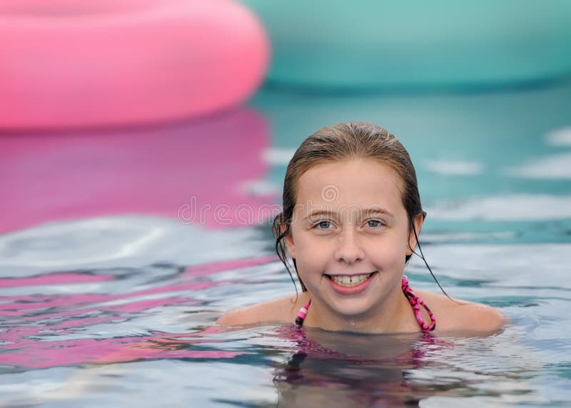 Young Girl in Swimming Pool Stock Photo - Image of pink, water: 16098232