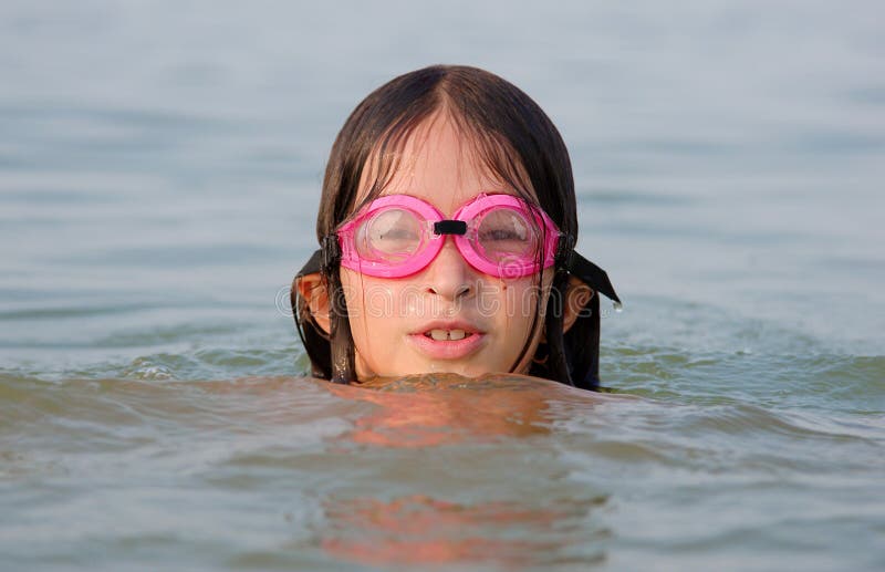 Young girl in water stock image. Image of buoyant, active - 27445015