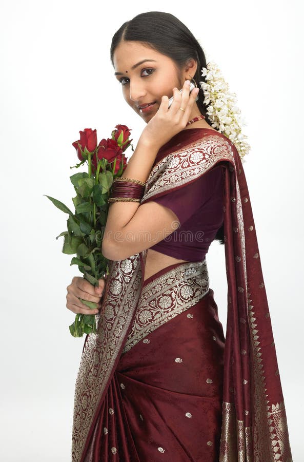 Young Girl Talking Over Mobile Holding Red Roses Stock Photo - Image of ...