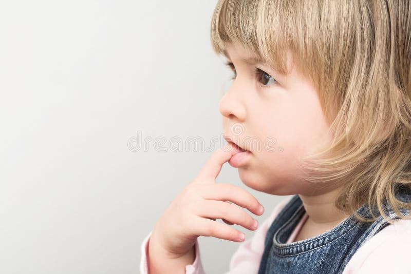 Young girl is thinking stock image. Image of children - 1840367