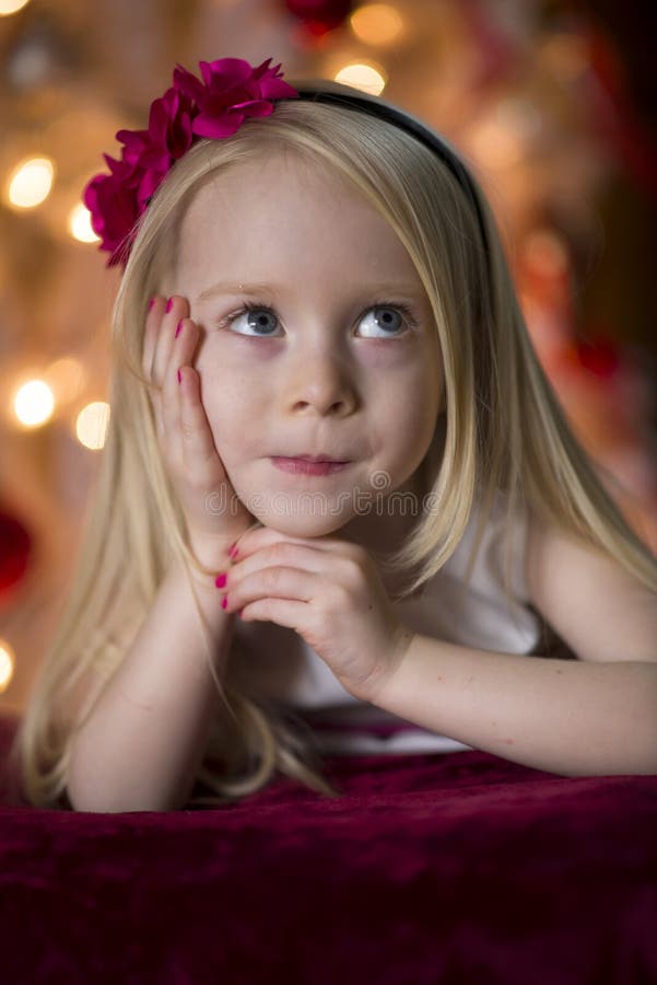 Young girl thinking stock image. Image of holiday, pink - 28116929