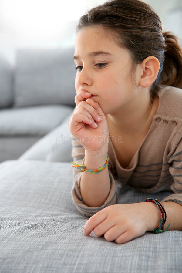 Young Girl with Thoughtful Look Stock Image - Image of closeup, look ...