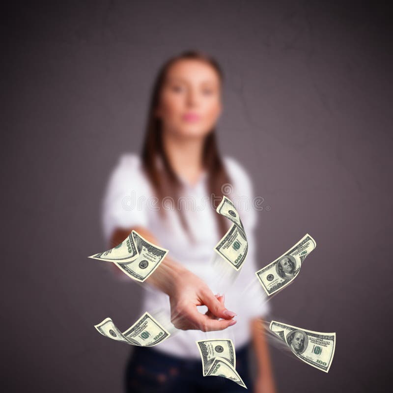 Young girl throwing money stock photo. Image of making - 34998982