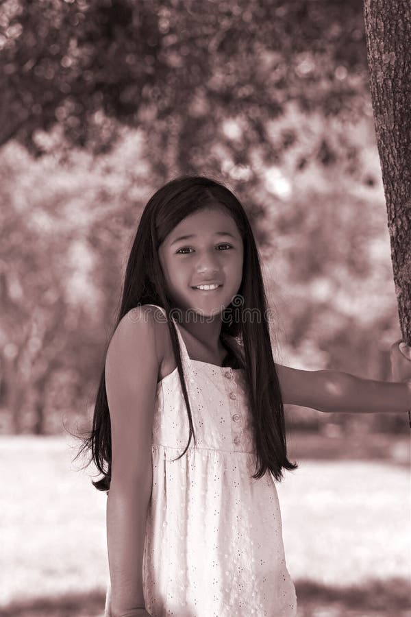 Young girl at tree stock photo. Image of latina, outside - 2767044
