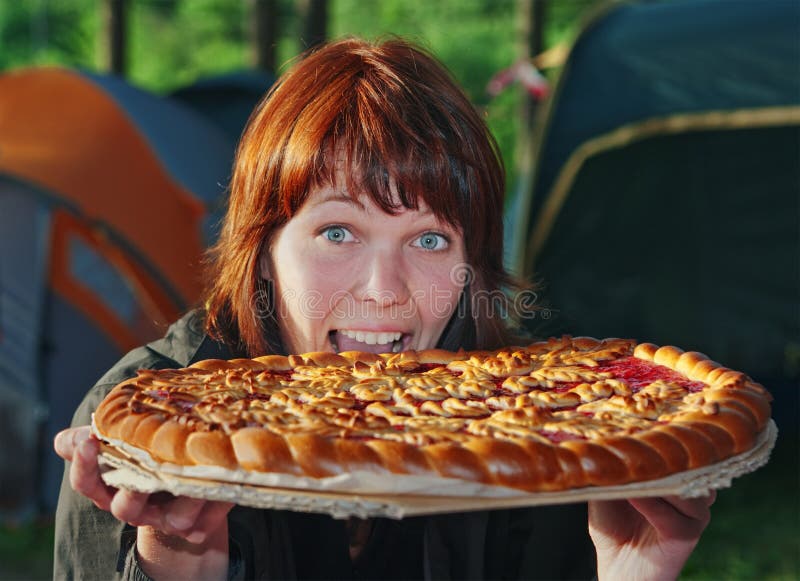 The Young Girl Tries To Eat the Pie Stock Photo - Image of rest, tired ...