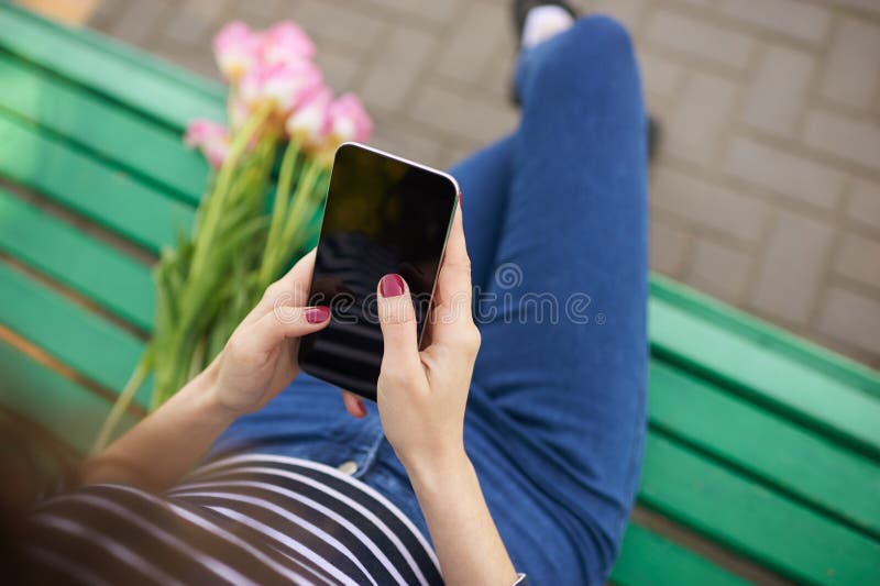 Young Girl Typing on the Screen of Her Mobile Phone Stock Image - Image ...