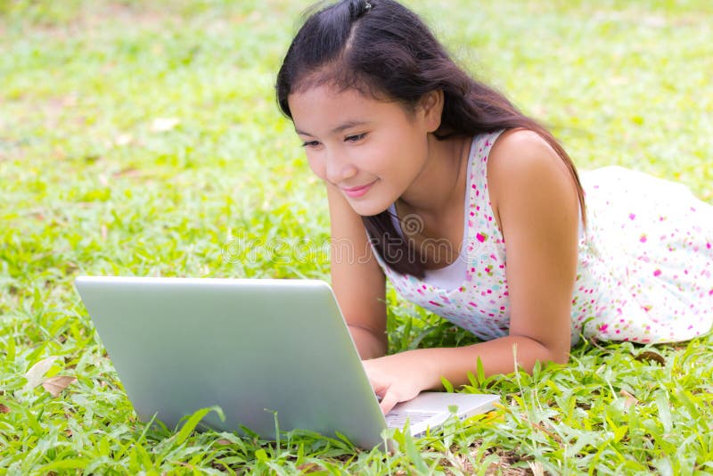 Young girl use laptop stock image. Image of academic - 26052093