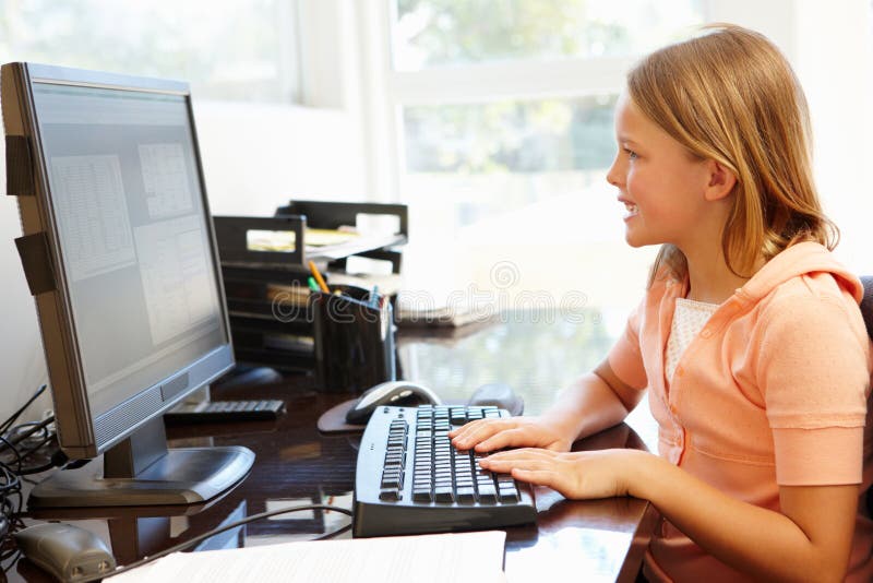 Young Girl Using Computer at Home Stock Photo - Image of child ...
