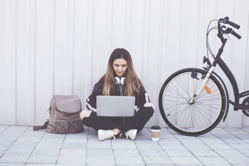 Young Girl Using Computer Outdoor Stock Image - Image of biking ...