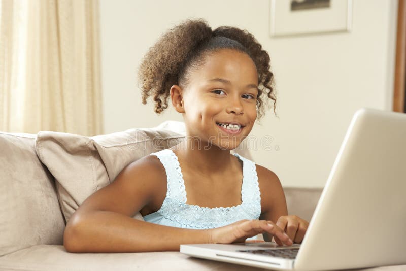 Young Girl Using Laptop at Home Stock Image - Image of laptop, people ...