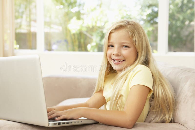 Young Girl Using Laptop at Home Stock Photo - Image of people, happy ...