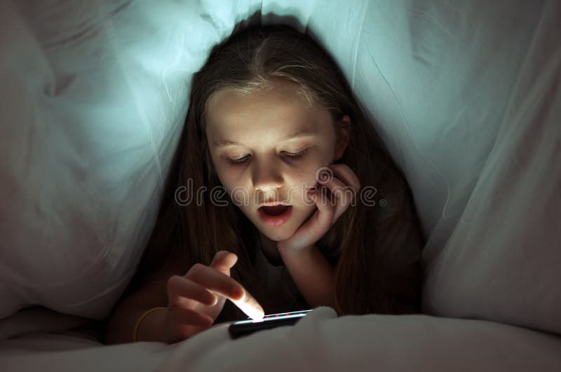 Young girl using a phone stock photo. Image of lifestyle - 134443092