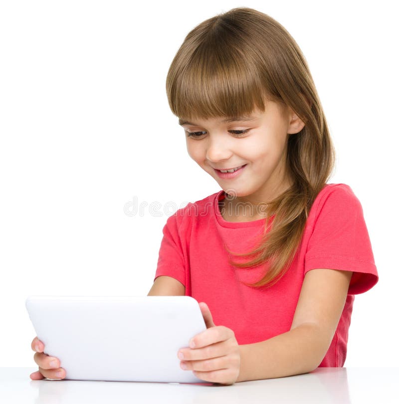 Young girl is using tablet stock image. Image of isolated - 46618757