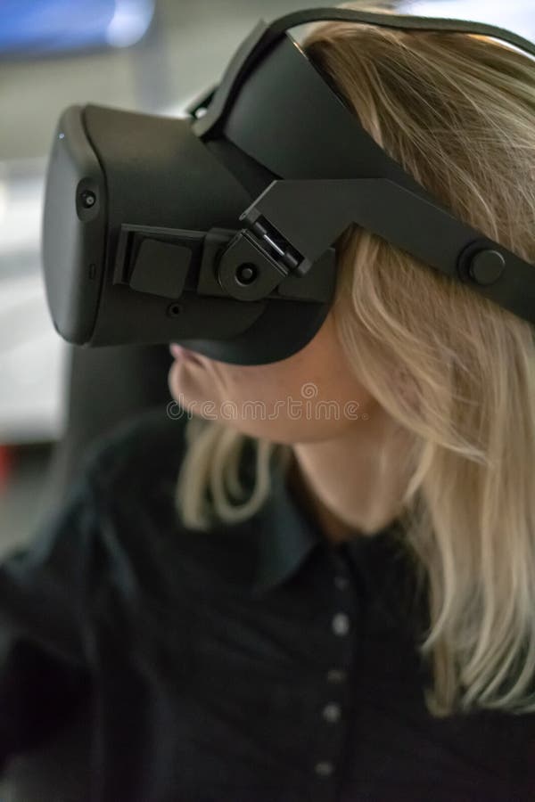 Young Girl in a Virtual Reality Glasses. Using VR Technologies in ...
