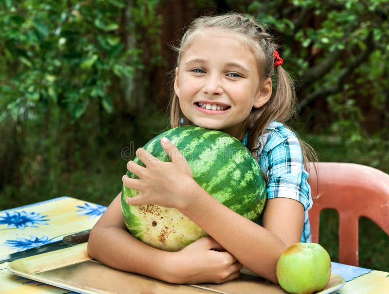 Young girl with watermelon stock image. Image of embrace - 28441665