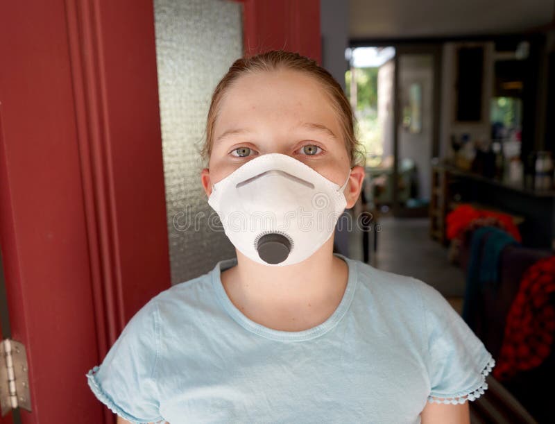 Young Girl Wearing Face Mask at Home Stock Image - Image of confined ...