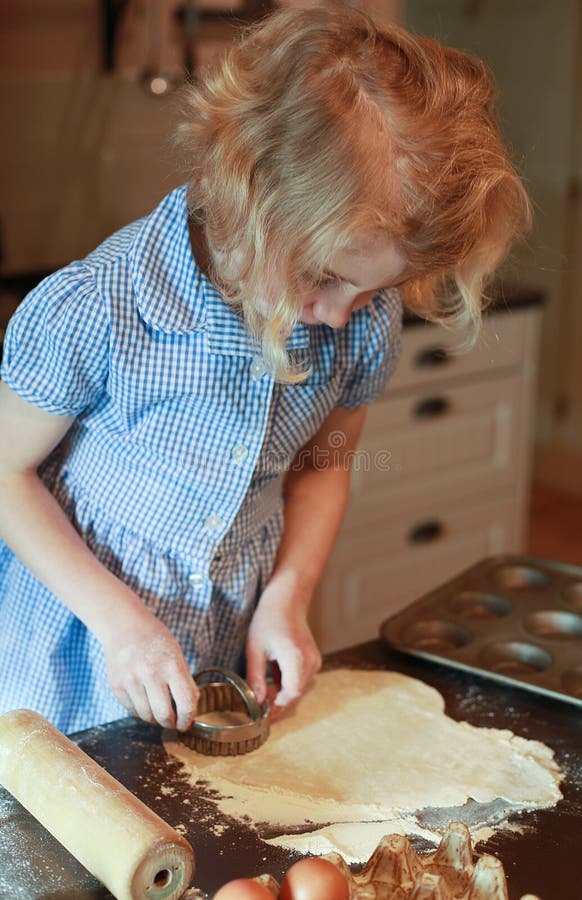 Young Girl Who is Making Pastry Stock Photo - Image of domestic, happy ...