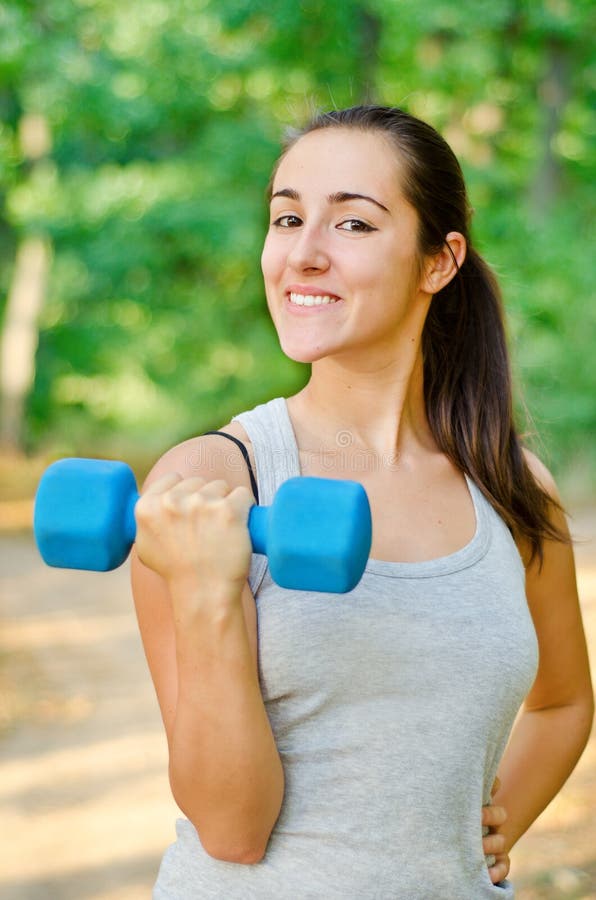 Young girl workout stock photo. Image of dumbbell, serenity - 21138690