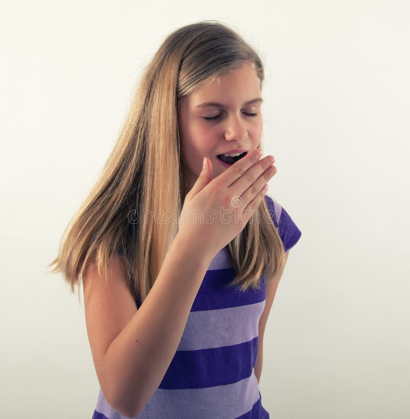 Young girl yawning stock image. Image of isolated, young - 89952581