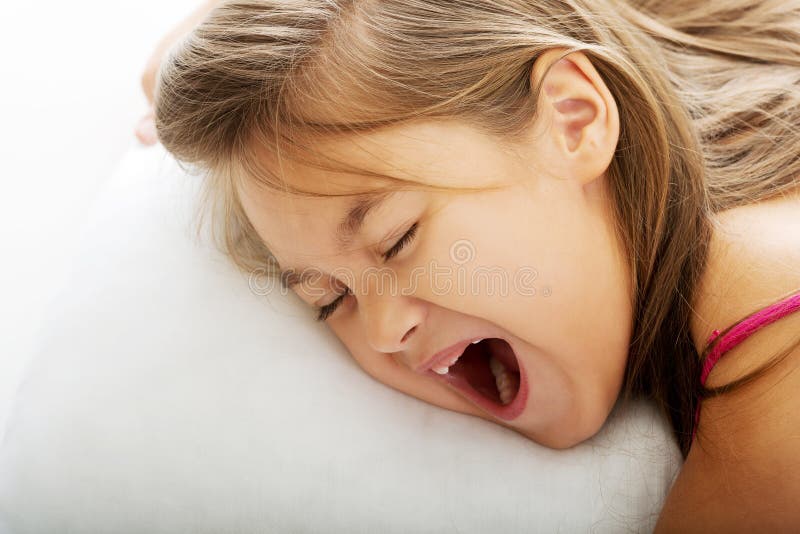 Young Girl Yawning while Waking Up Stock Image - Image of domestic ...