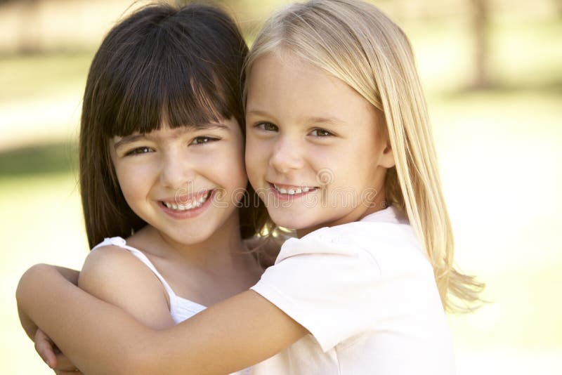 2 Young Girls Giving Each Other Hug Stock Photo - Image of sister ...
