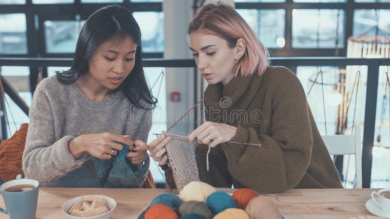 Teaching knitting indoors stock photo. Image of wool - 105064932
