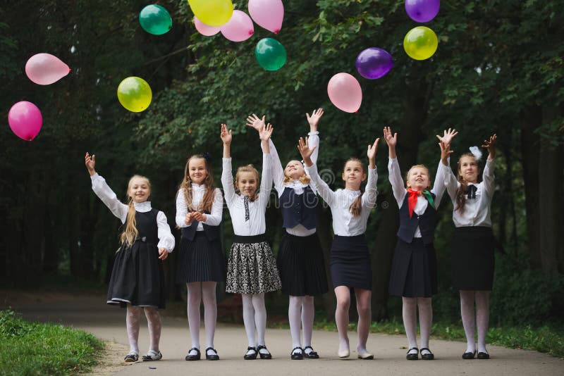 Young Girls in Uniform Outdoors Stock Photo - Image of celebration ...