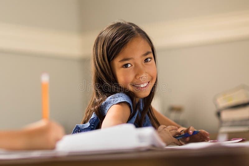 Young Girls Working on Their School Work Stock Image - Image of ...