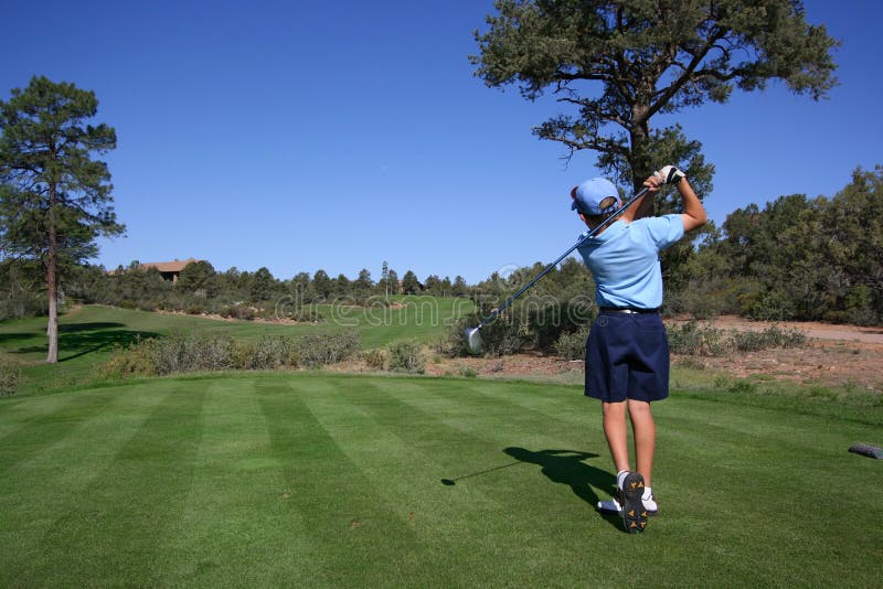 Young Golfer Hitting Off Tee Stock Photo - Image of putting, country ...