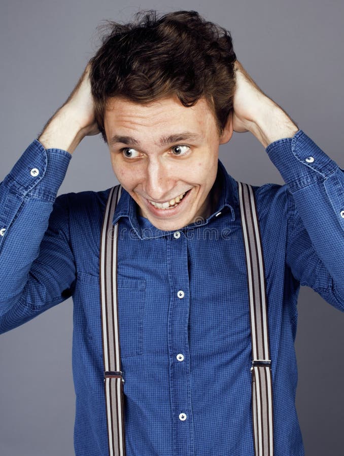 Young Goofy Man Looking Miserable Stock Photo - Image of isolated, male ...