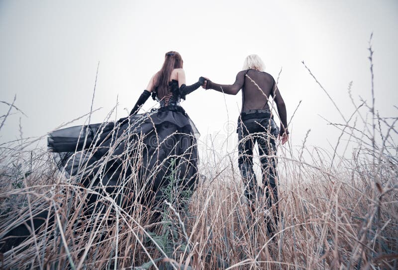 Young Goth Couple Walking on Field Stock Image - Image of field, love ...