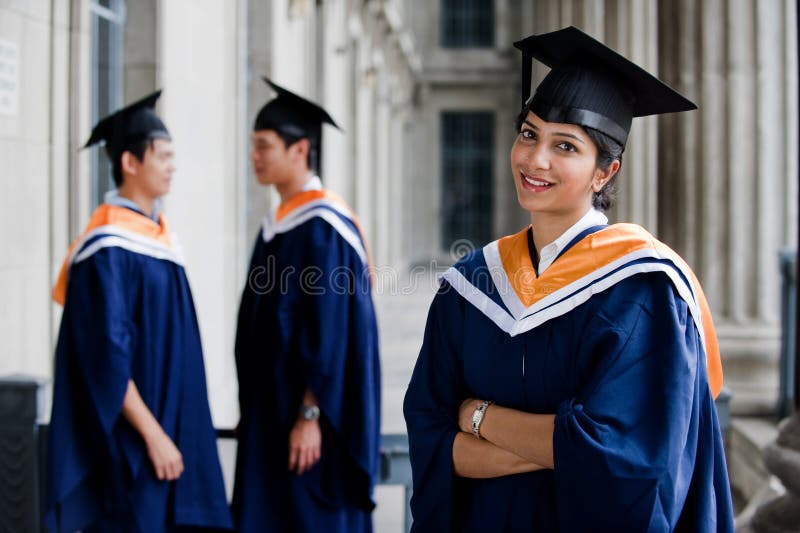 Young Graduates stock photo. Image of education, gown - 11475564