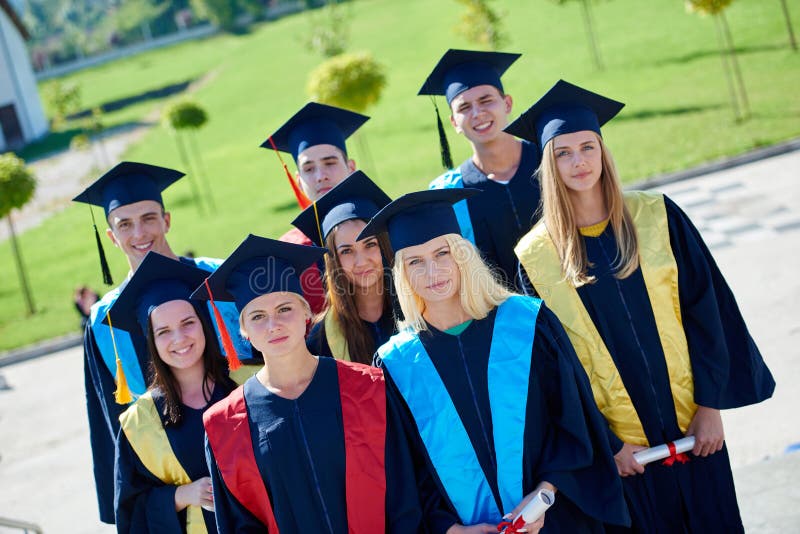Young Graduates Students Group Stock Image - Image of female, gown ...