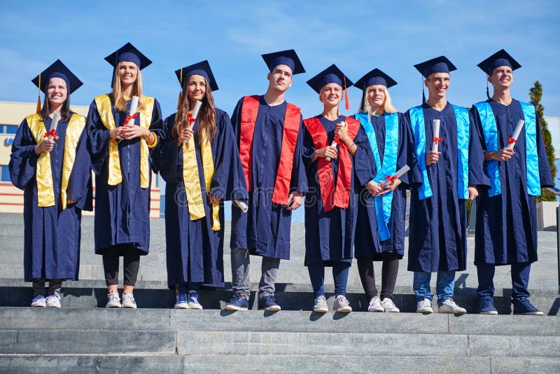 Young Graduates Students Group Stock Image - Image of female, gown ...