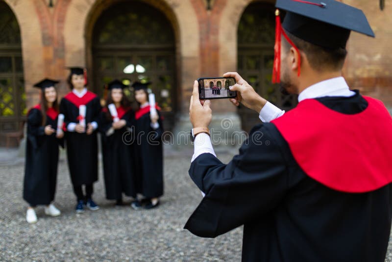 Young Group of Graduation Students Take Photo on the Phone at Campus ...