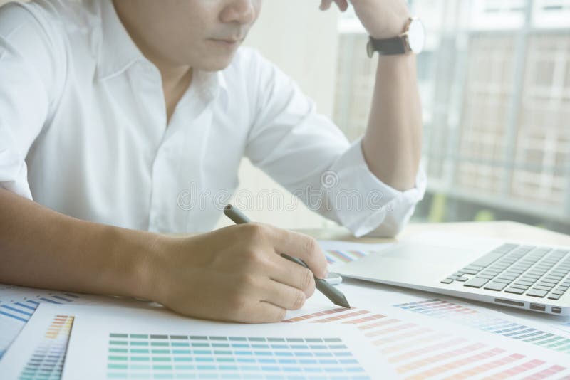 Young Graphic Designer Working with Computer and Color Swatch. C Stock ...