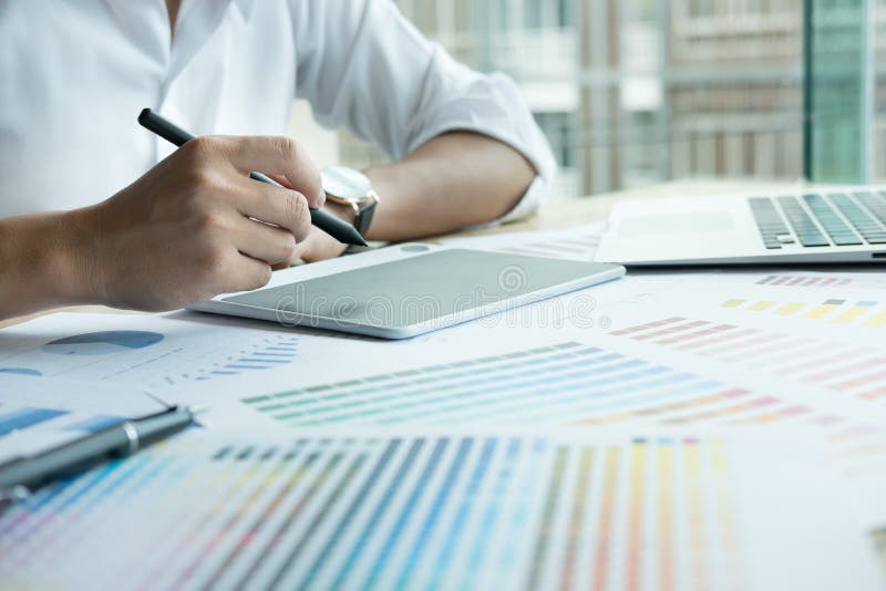 Young Graphic Designer Working with Computer and Color Swatch. C Stock ...