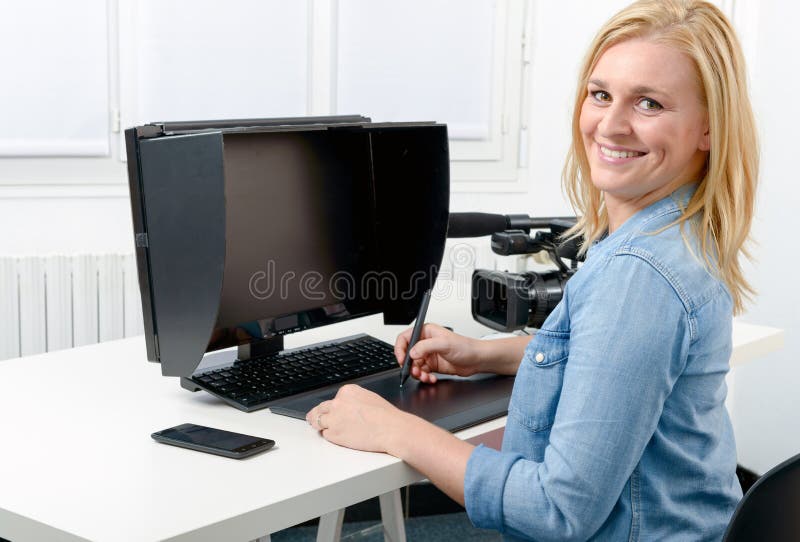 Young Graphic Designer Working on Computer Using Tablet Stock Image ...