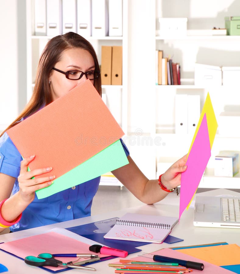 Young Graphic Designer Working on Laptop Using Tablet at Home Stock ...