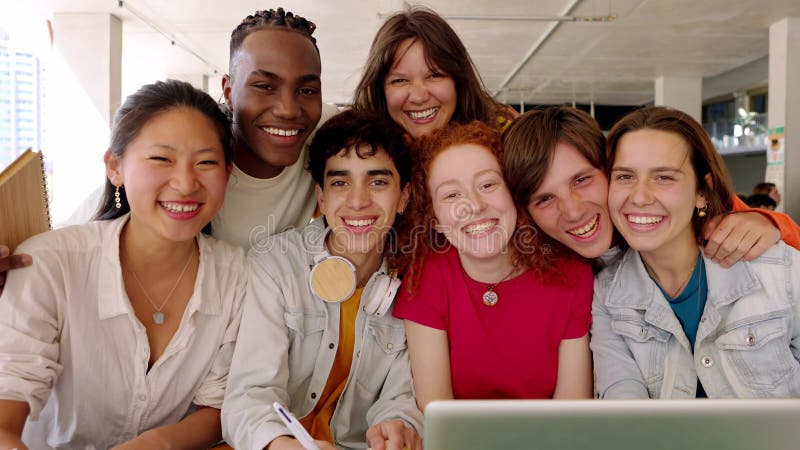 Happy Group of Multiracial Students Sitting on the Grass at College ...